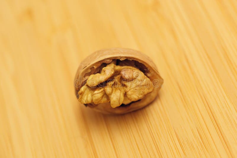 Half-opened Walnut Lies on the Table. Top View Stock Photo - Image of ...