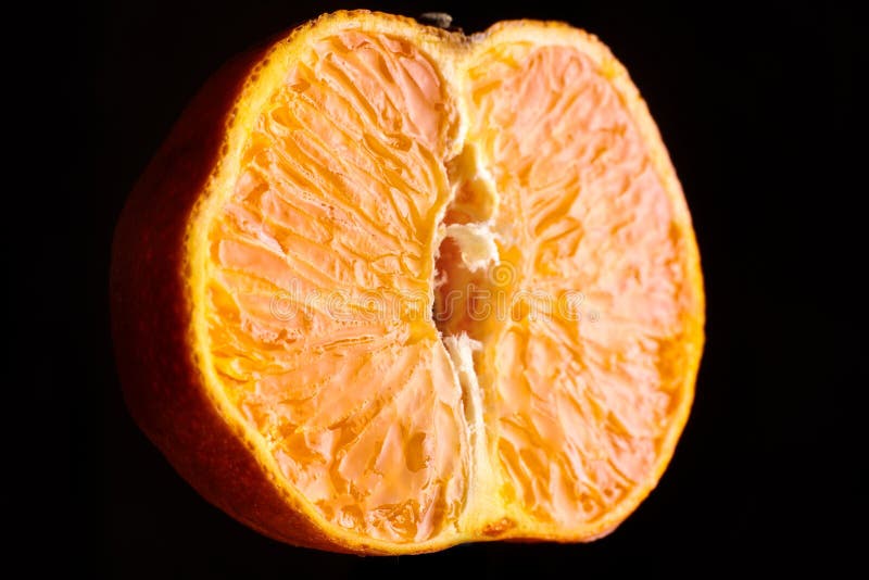 Half an Orange Close-up on a Black Background Stock Image - Image of ...
