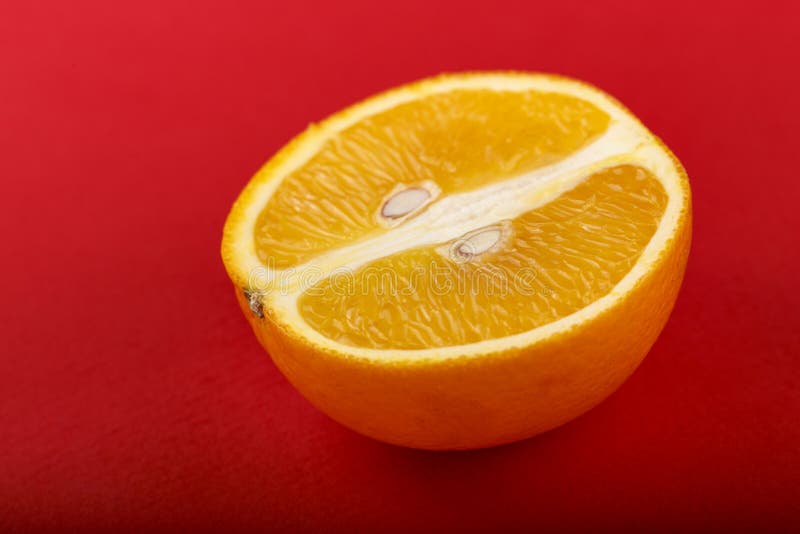 Half an Orange on a Red Background Stock Image - Image of food, health ...