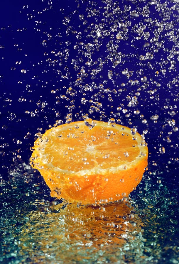 Half of Orange with Stopped Motion Water Drops Stock Image - Image of ...