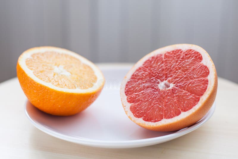 Half an orange stock photo. Image of homemade, table - 84529938