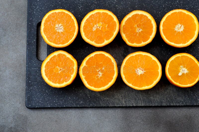 Half oranges on tray stock photo. Image of healthy, slide - 87466394