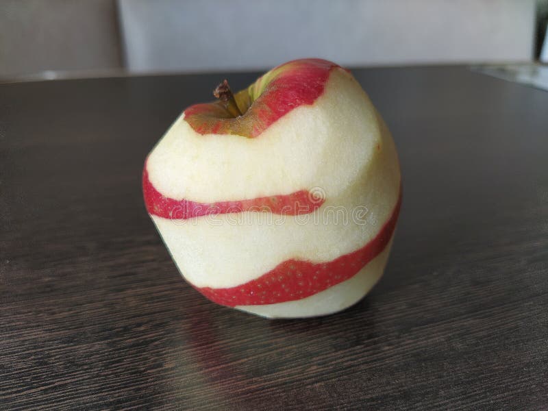 Half Peeled Red Apple on the Table Stock Image - Image of freshness ...