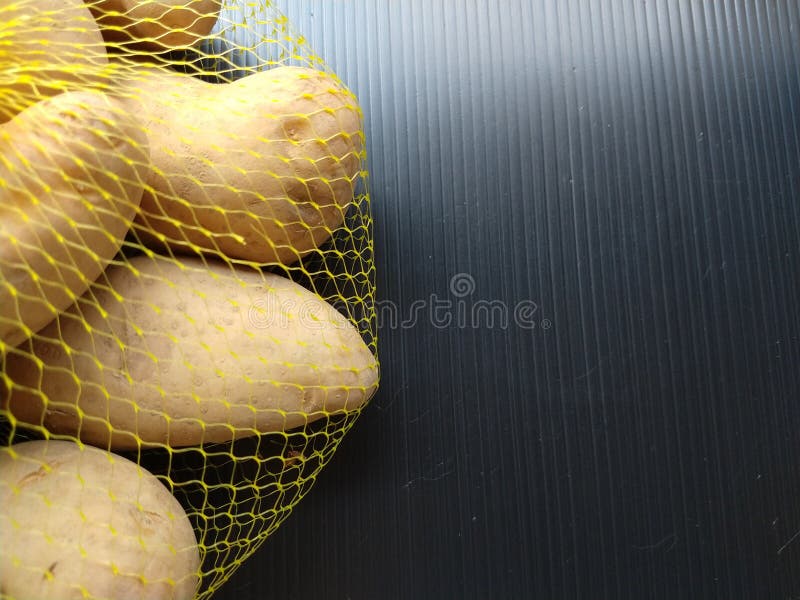 Half Picture of Mesh Potato Bag Stock Photo - Image of vegetable ...