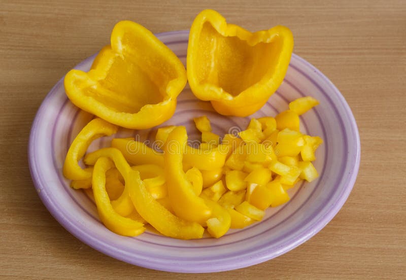 Half and pieces of pepper stock image. Image of pepper - 158061525