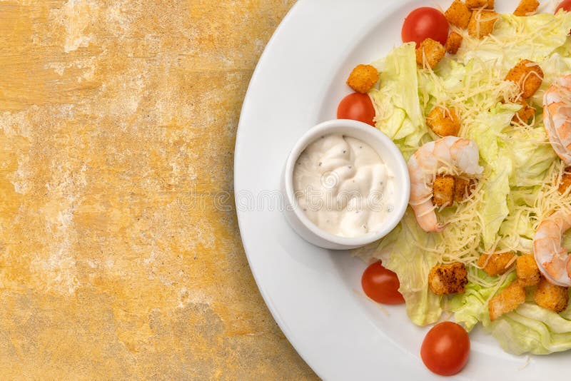 Half a Plate of Caesar Salad on Textured Table Stock Image - Image of ...