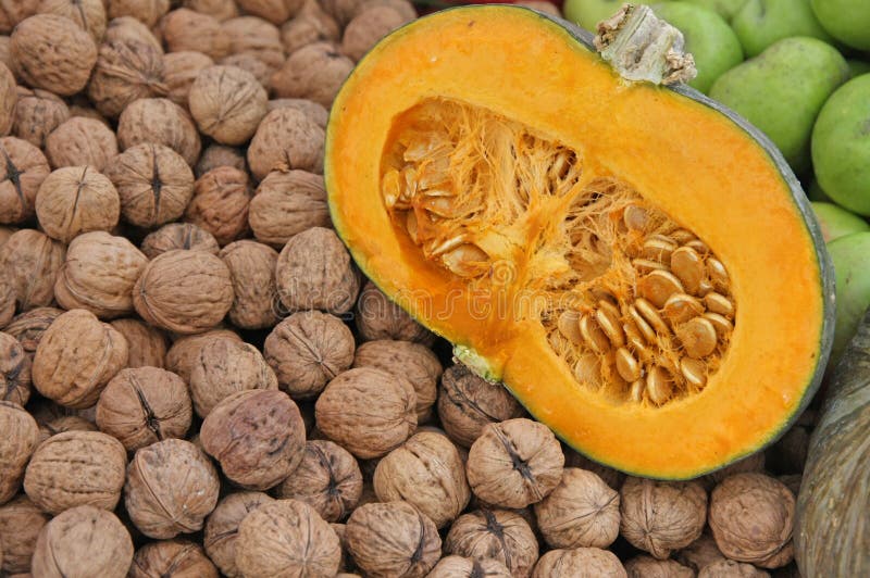 Half Pumpkin with Walnuts and Green Pears Ripe Stock Photo - Image of ...
