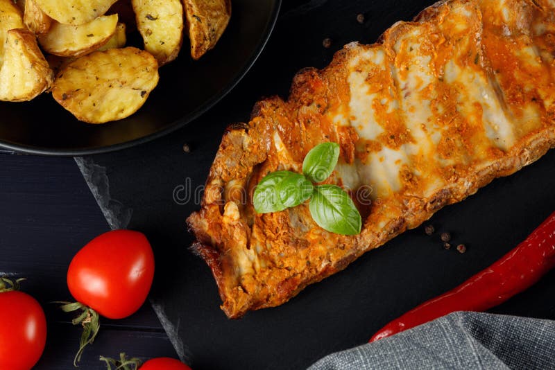 Half Rack of Barbecue Pork Ribs with Fries Potatoes Stock Image - Image ...