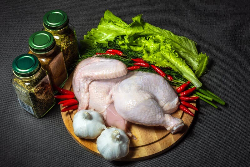 Half a Raw Chicken Served Vegetable, Jars of Spices Stock Image - Image ...