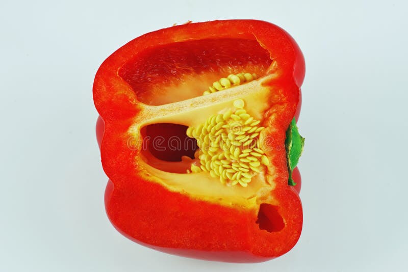 Half of a Cut Red Pepper Lying on a White Background Stock Photo ...