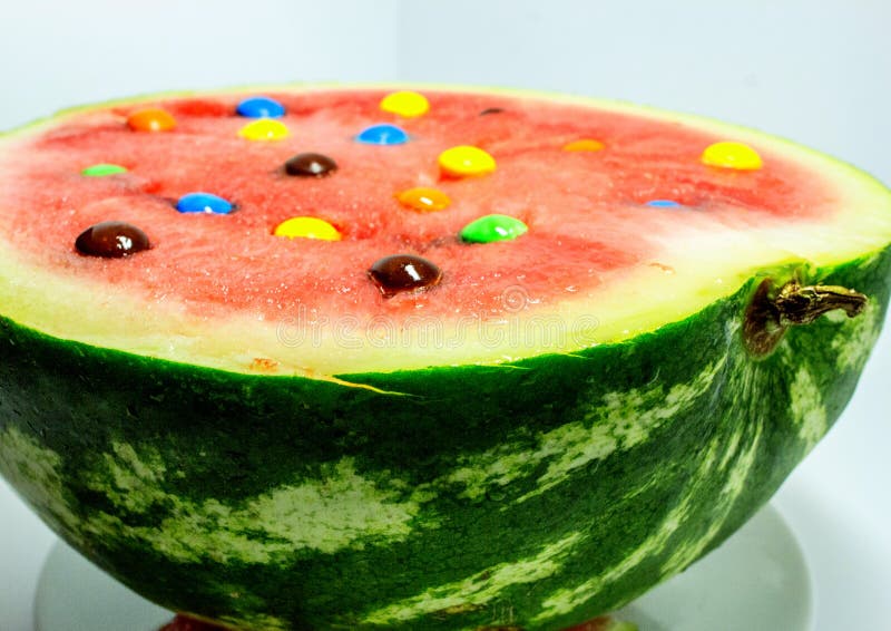 Half of Red Watermelon with Colored Candy. Stock Photo - Image of food ...