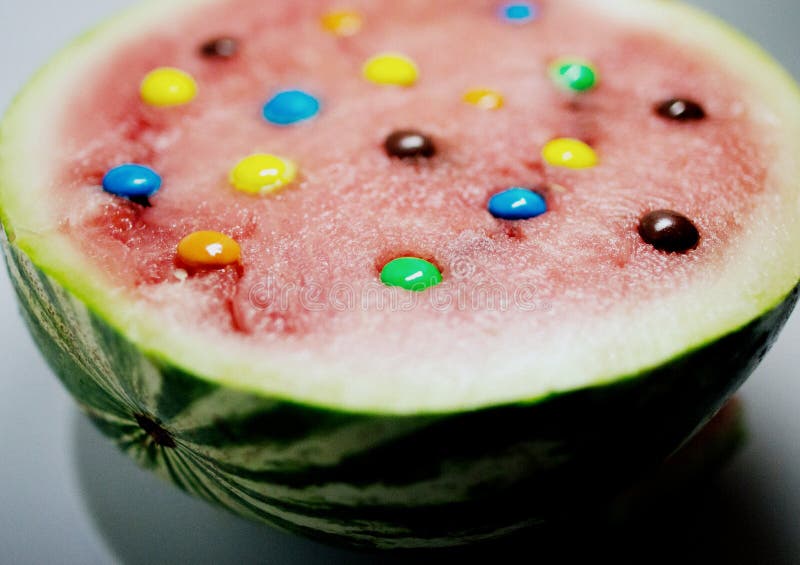 Half of Red Watermelon with Colored Candy. Stock Image - Image of ...