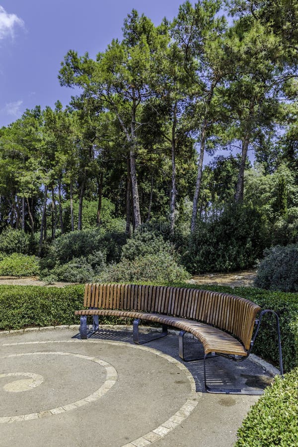 Half Round Bench in the Park Vertical Stock Photo - Image of footpath ...