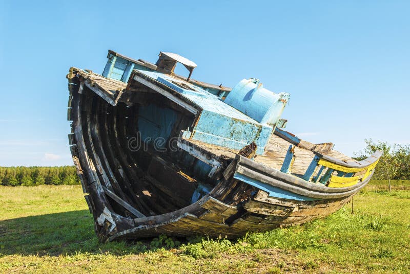 Half of Shipwreck on Field stock image. Image of ship - 312396785