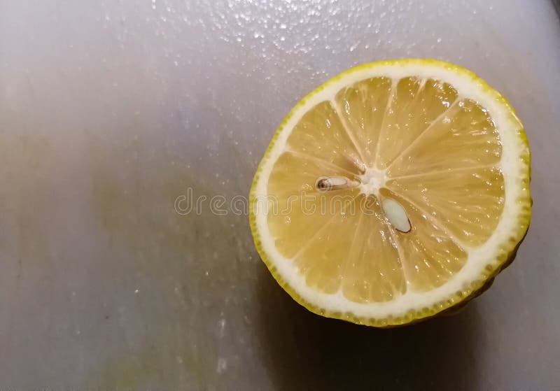 A half slice of lemon stock photo. Image of vitamin - 181598352
