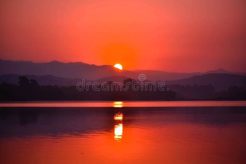 HALF SUN RISE BEHIND the MOUNTAINS Stock Photo - Image of outdoor ...