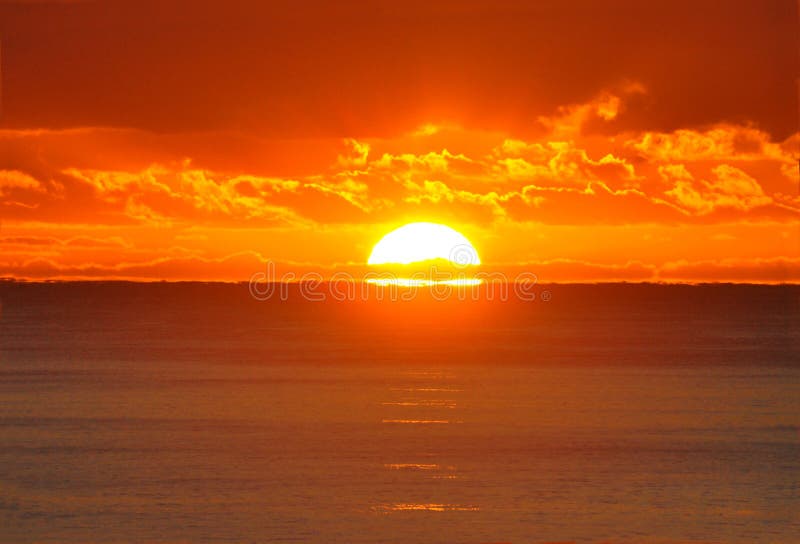 A Half Sun Shows Over Ocean at Sunrise Stock Image - Image of morning ...