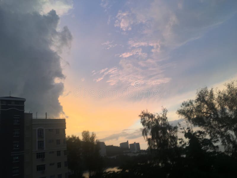 Half Sunset, Half Dark Clouds, Heavy Rain is Coming Stock Image - Image ...