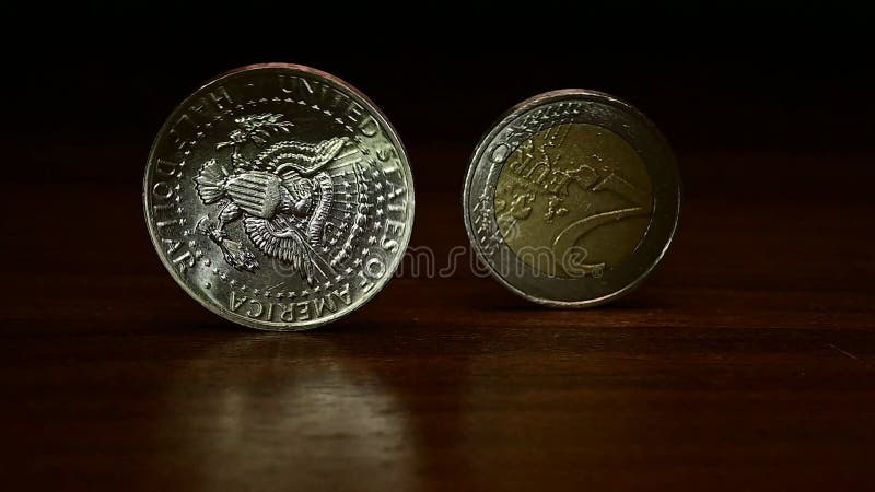 A Half US Dollar Rolls Across the Table Stock Footage - Video of ...