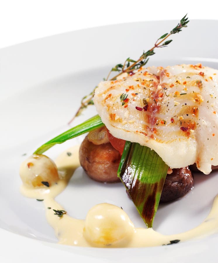 Halibut on Vegetable with Sauce Stock Image - Image of basil, onion ...