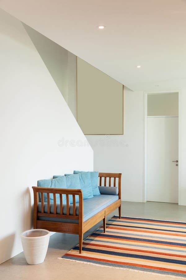 Hall with Divan and Striped Rug Stock Image - Image of staircase ...