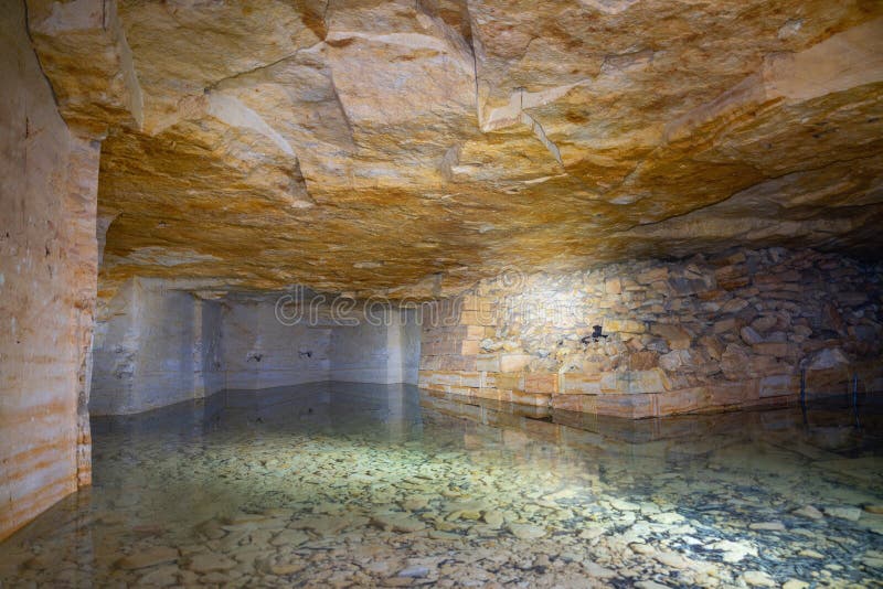 A Hall Flooded with Water in the Old Shell Catacombs Stock Photo ...