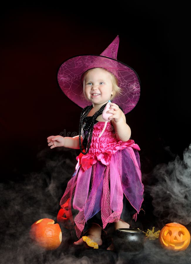 Halloween Baby Witch with a Carved Pumpkin Stock Image - Image of ...