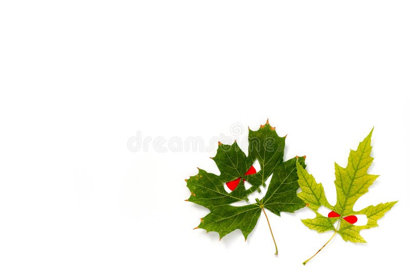 Halloween Background - Multi-colored Faces with Red Eyes from Maple ...