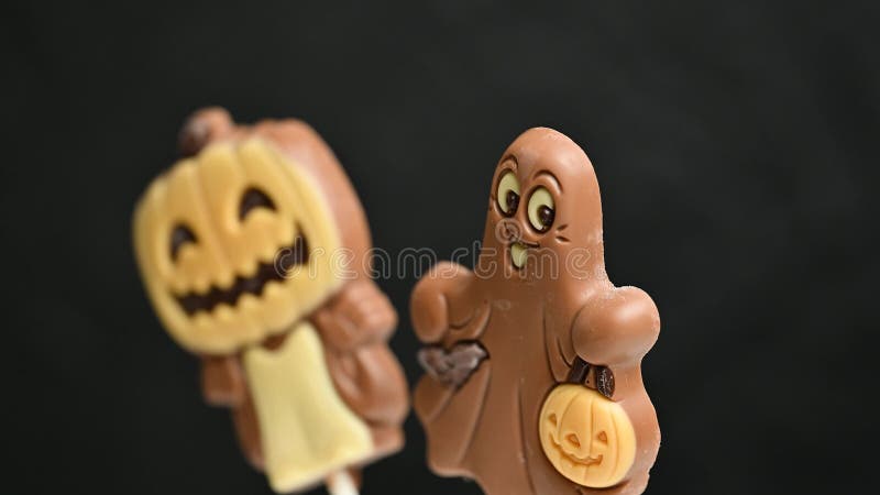 Halloween chocolate ghost stock video. Video of surprise - 325036059