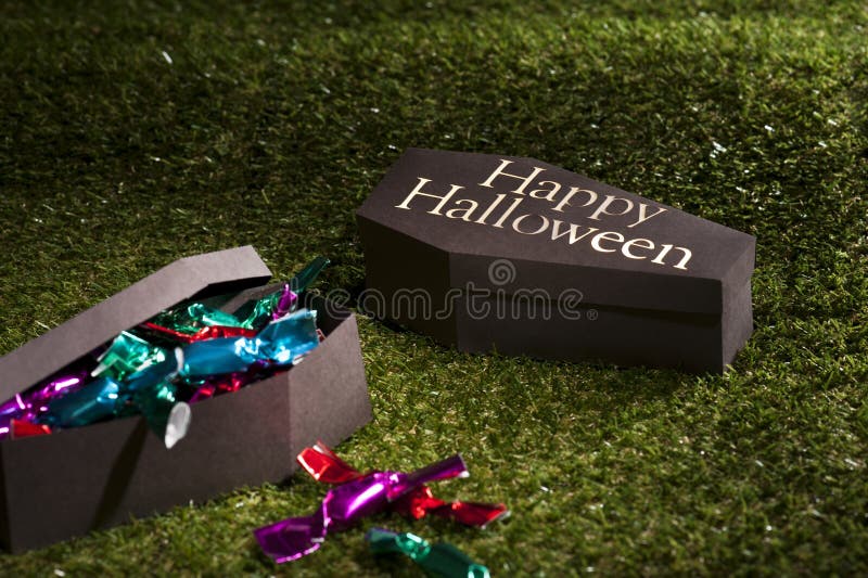 Halloween Coffin on Lawn with Sweets Stock Image - Image of magic, fear ...