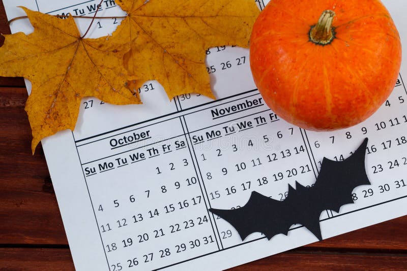 Halloween is Coming Soon, October Calendar and Pumpkin. Stock Photo ...