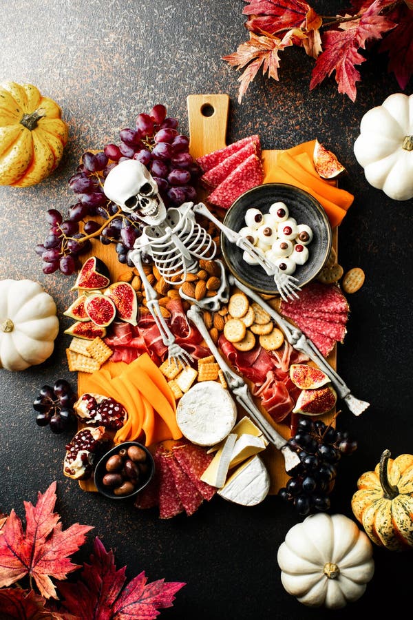 Halloween Dark Table Setting with Cheese Board Decorated with Spooky ...