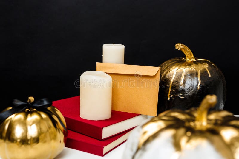 Halloween Decor on White Table Over Black Background. Stock Photo ...