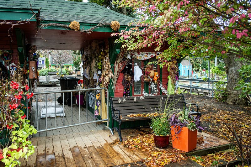 Halloween Decoration on a Nice Little House with a Bench and Different ...