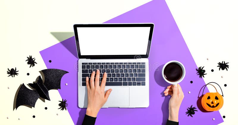 Halloween Decorations with Person Using a Laptop Computer Stock Image ...