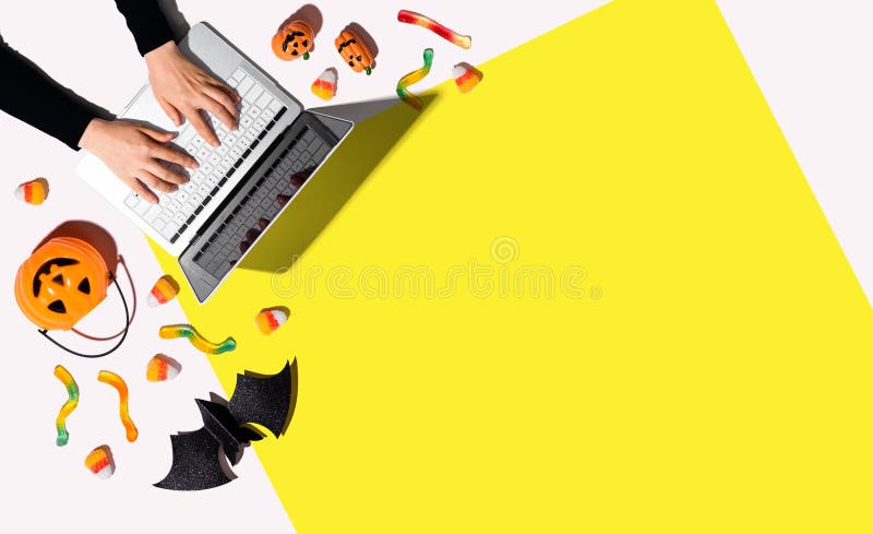 Halloween Decorations with Person Using a Laptop Computer Stock Image ...