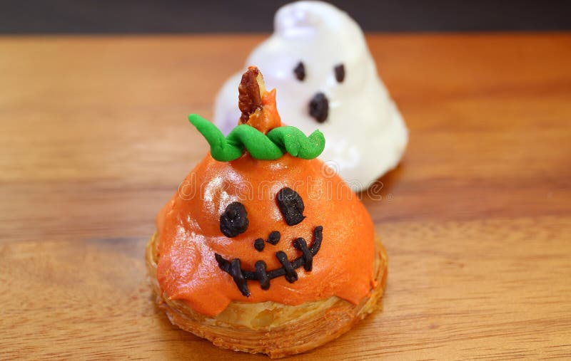 Halloween Jack O Lantern Shaped Sugar Glazed Croissant with Blurry ...