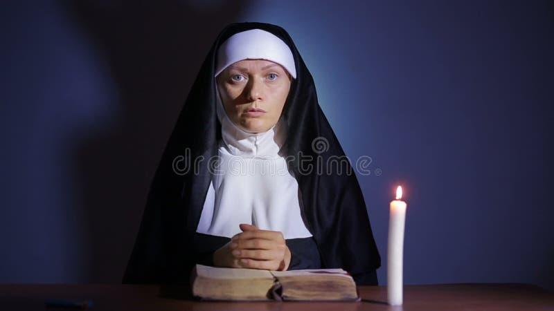 Halloween. Nun Prays. Shadows in the Form of Devil. Exorcism Stock ...