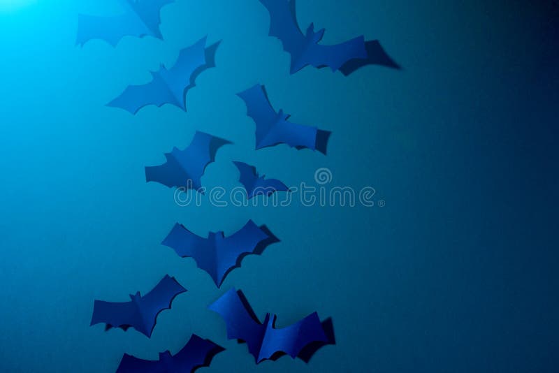 Halloween Photo of Blue Paper Bats Flying Up on Dark Blue Background ...