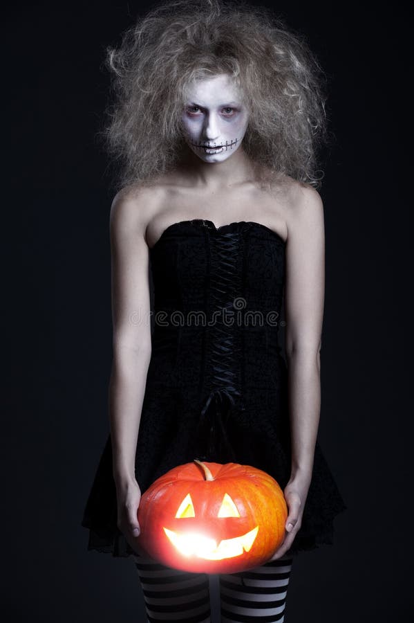 Halloween. Portrait of a Young Beautiful Girl with Skeleton Makeup on ...