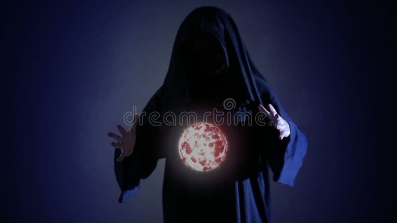 Halloween. Powerful Witch or Wizard with Fireball in Hands. Ball from ...