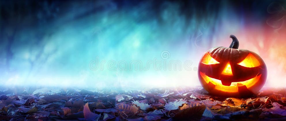 Halloween Pumpkin Burning in a Scary Forest Stock Image - Image of ...