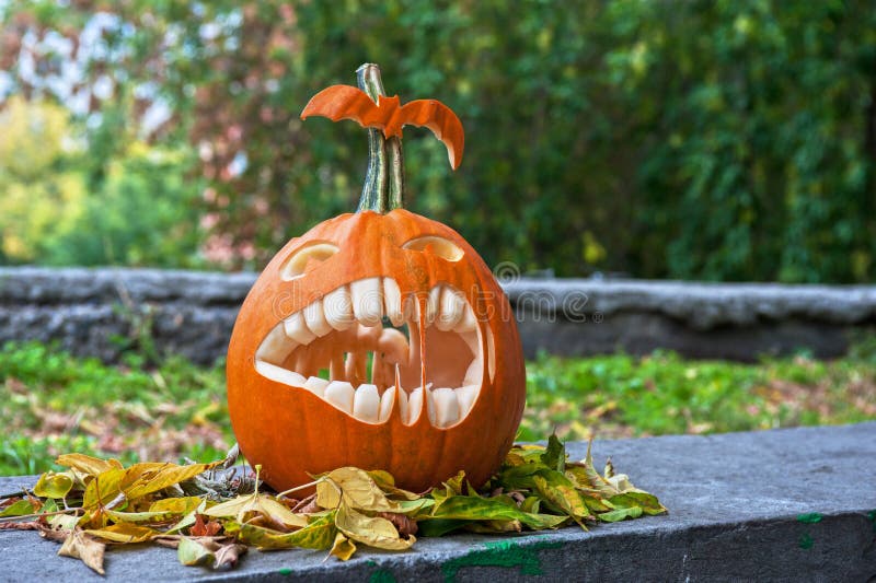 Carved Pumpkin Face with a Brain Stock Photo - Image of stem, jack ...