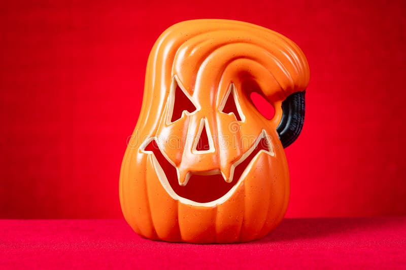 A Halloween Pumpkin with Scary Face Jack O Lantern on Red Stock Photo ...