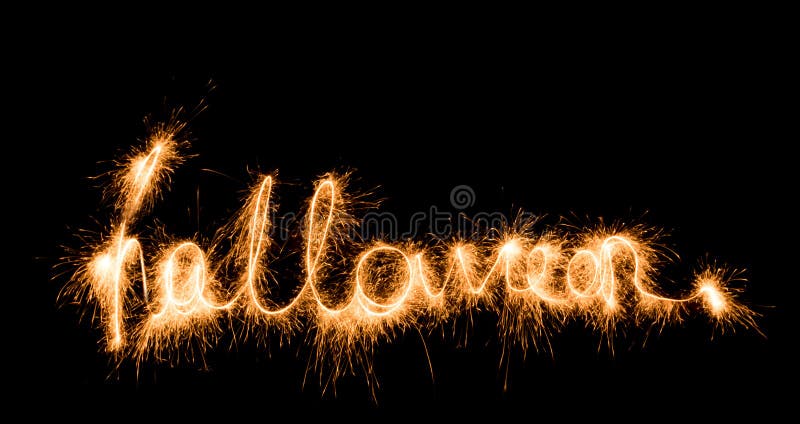 Halloween Sign Sparklers on Black Background Stock Image - Image of ...