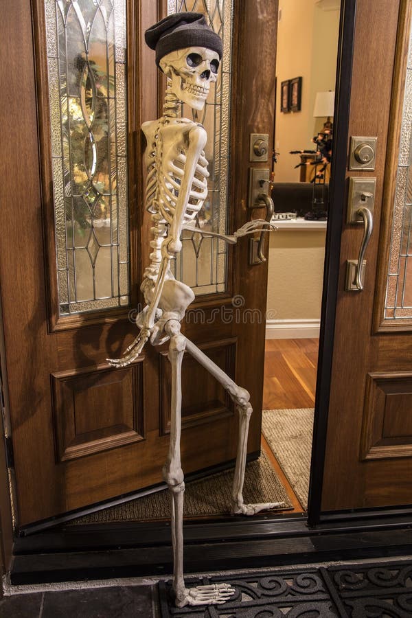 Halloween Skeleton Greeting at the Door Stock Image - Image of pumpkins ...