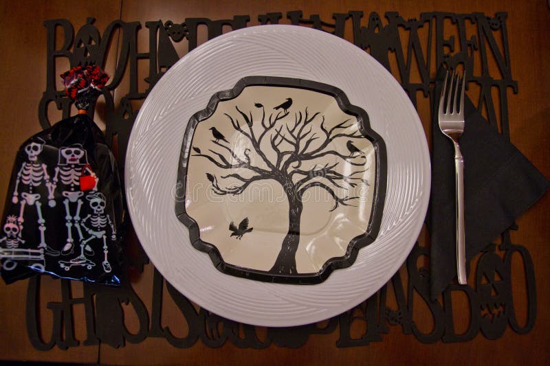 Halloween Themed Table Setting with Spooky Plate Design and Decorative ...