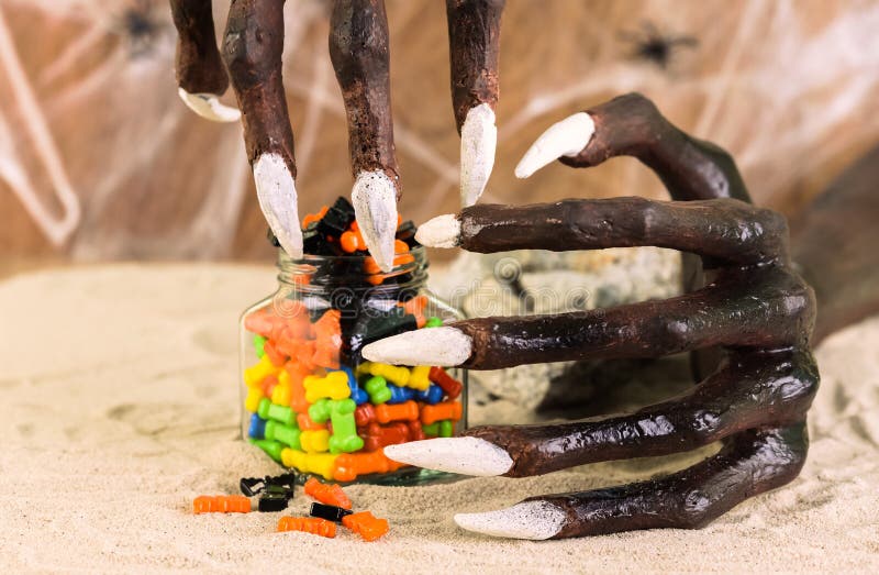 Halloween Witch Hands and Colorful Candies Stock Photo - Image of ...