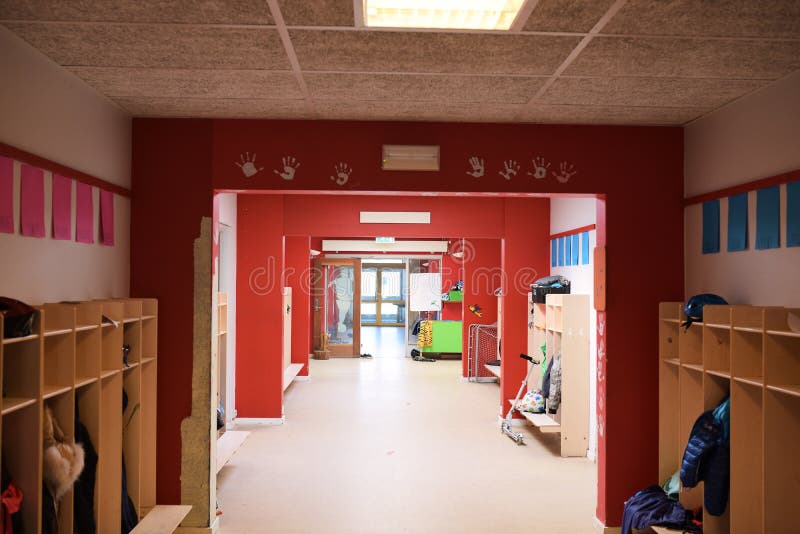 Hallway with Red Walls at School or Kindergarten Stock Image - Image of ...