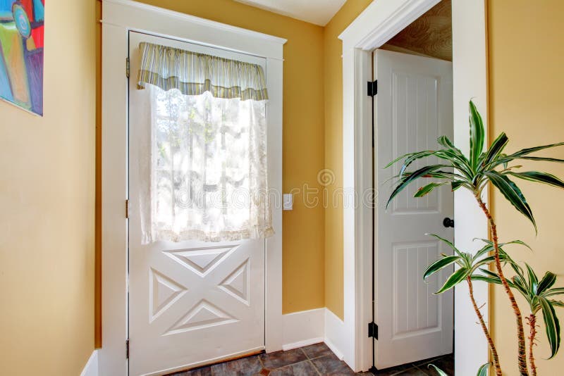 Hallway with Two White Doors and Yellow Walls. Stock Image - Image of ...